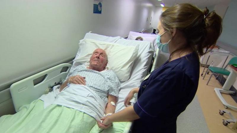 Romford: Patient care in Queen's Hospital corridors 'now normal' - BBC News