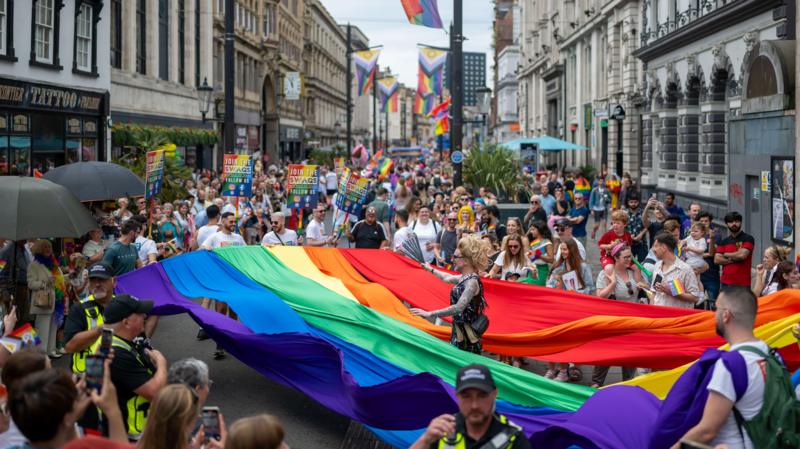 Pride Cymru: Thousand descend on Cardiff for anniversary parade - BBC News