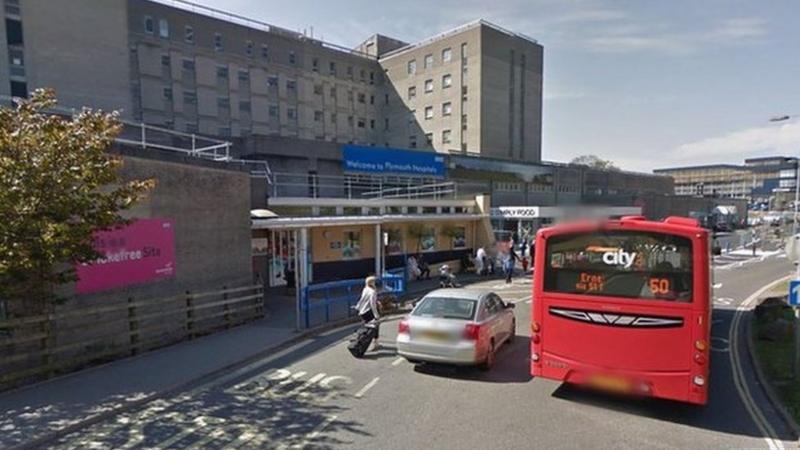 Derriford Hospital on 'red alert' as extra beds fill up - BBC News