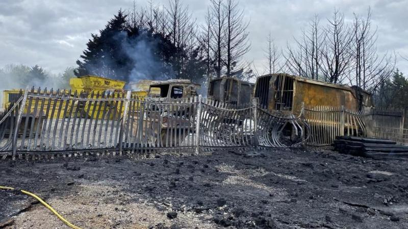 Four lorries and 10 skips badly damaged in Basildon fire - BBC News