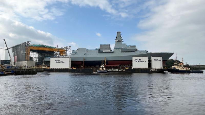 New Navy frigate HMS Cardiff makes first journey on giant barge - BBC News