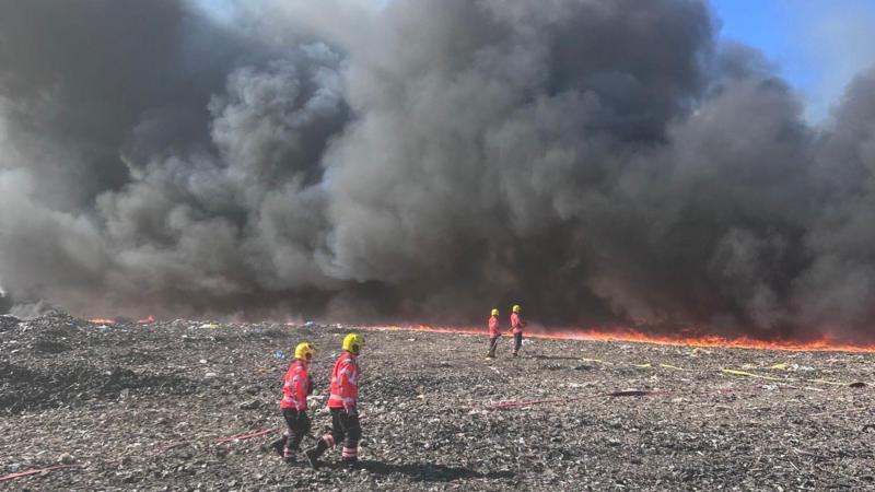 Fire crews tackle large blaze Wilburton landfill site - BBC News