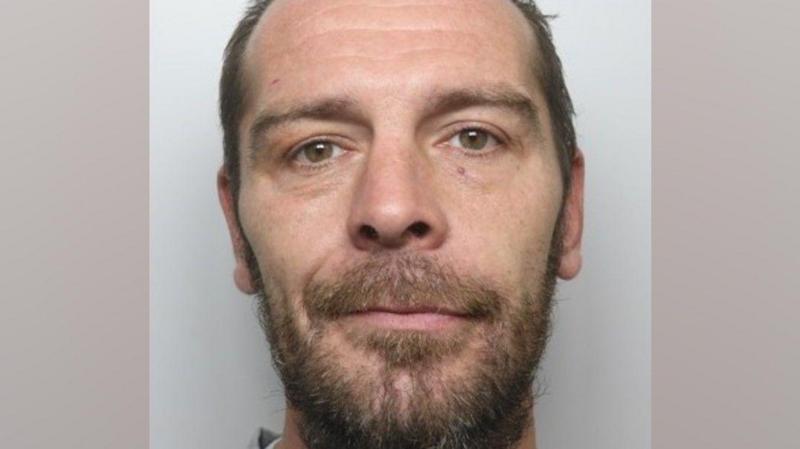 Burton-upon-Trent man murdered father and hid body in box - BBC News