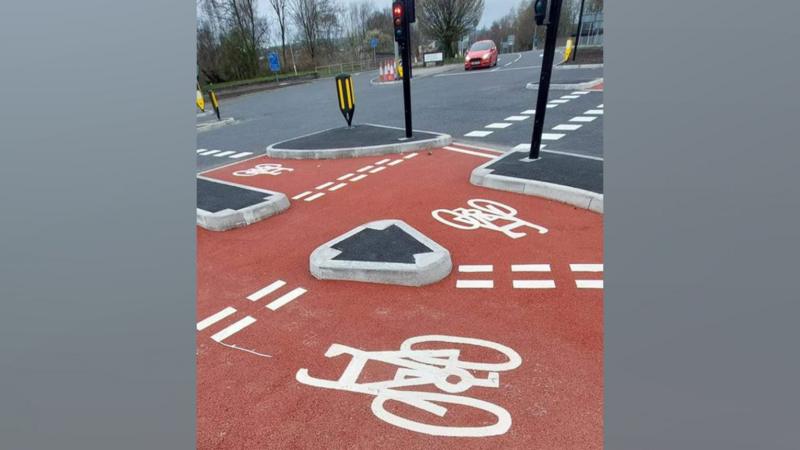 Stretford's controversial 'ham-fisted' cycle lanes to be replaced - BBC News