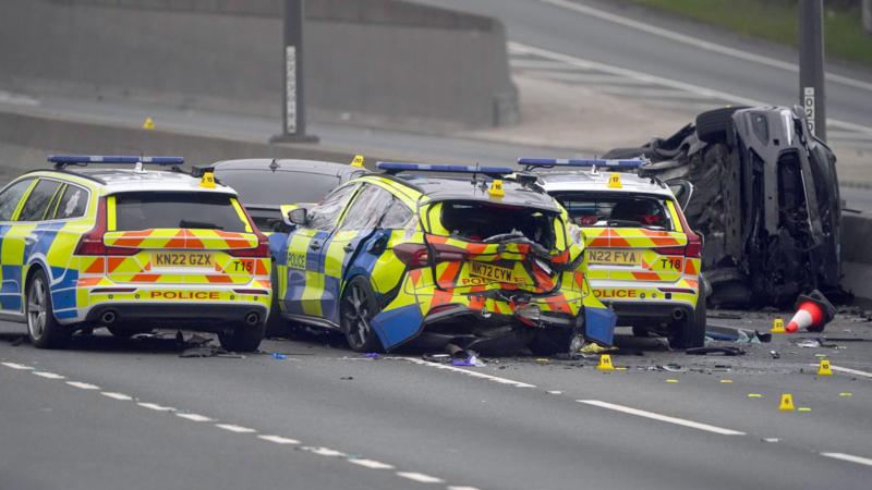 Newcastle A1 police car crash sees two people arrested - BBC News