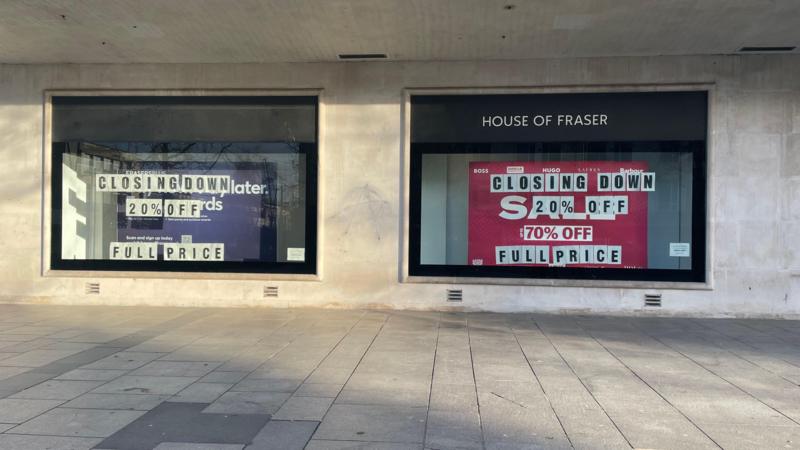 Closing down signs in Plymouth's House of Fraser store - BBC News