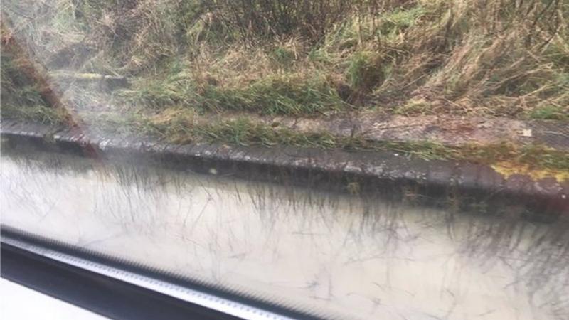 Floods cause disruption across across the Midlands - BBC News