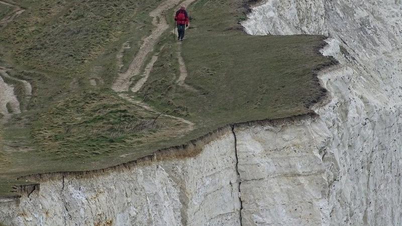 Beachy Head safety alert as walkers spotted above crack - BBC News