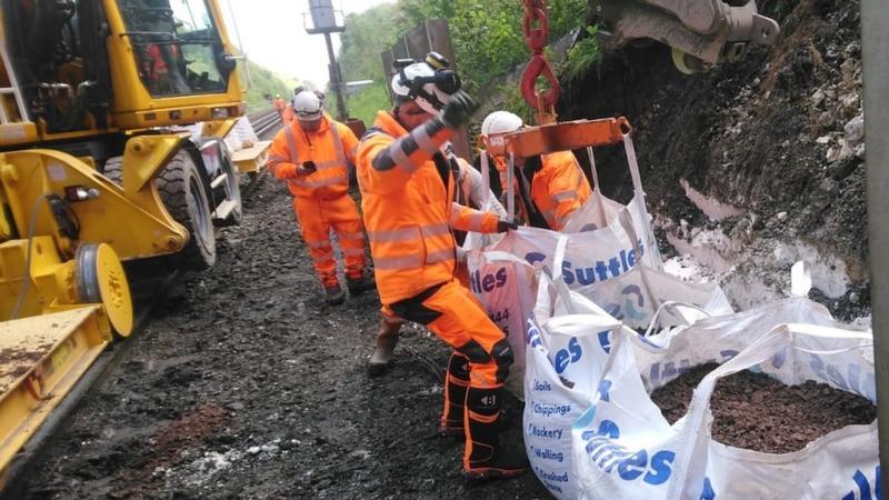 Basingstoke-Winchester landslip: Rail line reopens - BBC News