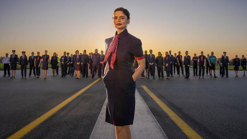BA unveils jumpsuits in first uniform revamp for 20 years - BBC News