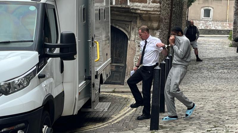 Seven appear in court over Plymouth acid attack on man - BBC News