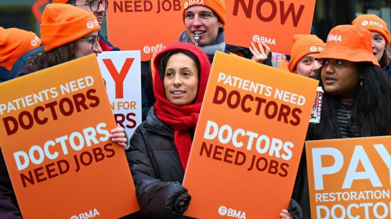 Resident doctors in England vote in favour of more strike action - BBC News