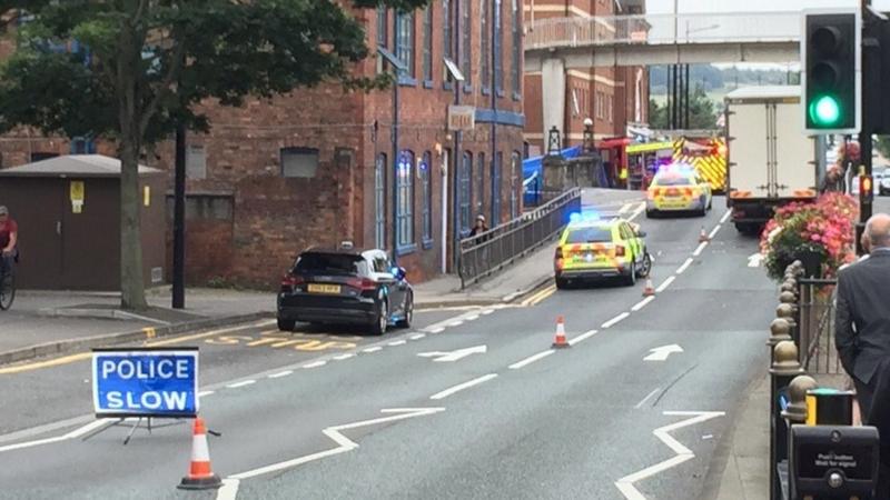Woman trapped under lorry in Lincoln city centre - BBC News