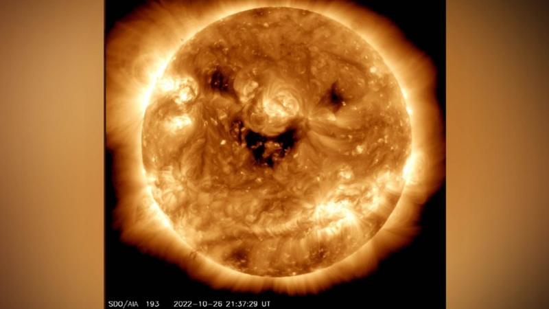 Nasa captures pic of the Sun 'smiling' with a happy face - BBC Newsround