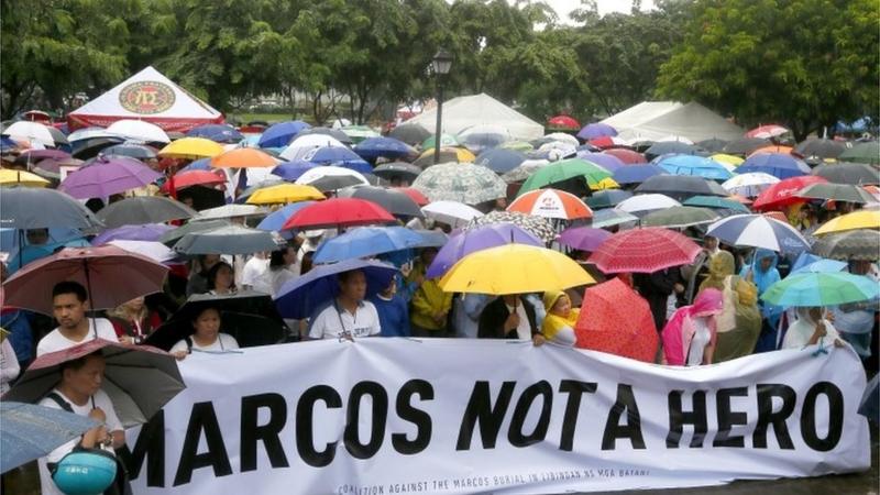 Philippines Marcos: Protest against 'hero' burial - BBC News
