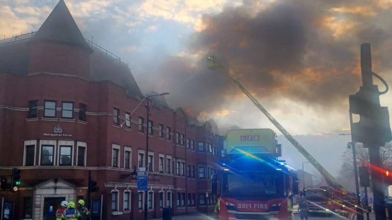 Difficult night after police station fire, says Met commander - BBC News