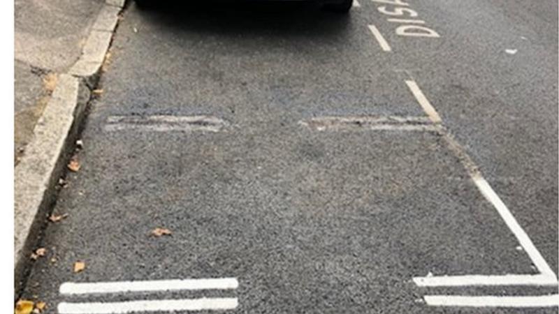 Merton: Disabled parking bay painted around car, driver says - BBC News