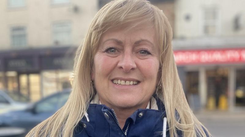 March's 'wonky' Christmas tree lights turned on - BBC News