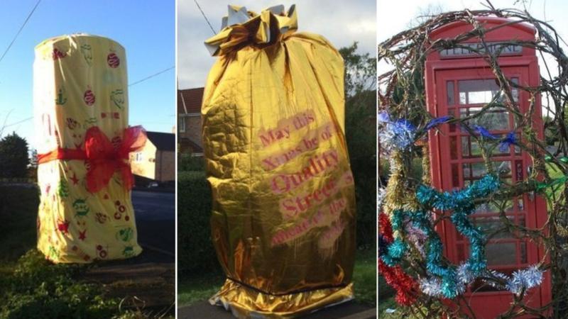 Phone box gets festive Santa makeover in Prickwillow - BBC News