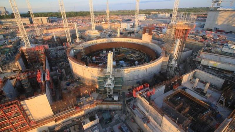 Hinkley C nuclear reactor roof lifted into place - BBC News