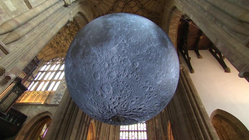Giant moon sculpture returns to Exeter Cathedral - BBC News
