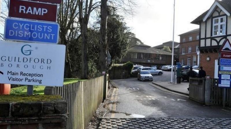 Guildford: Reports finds council overspend of £13.5m on contract - BBC News