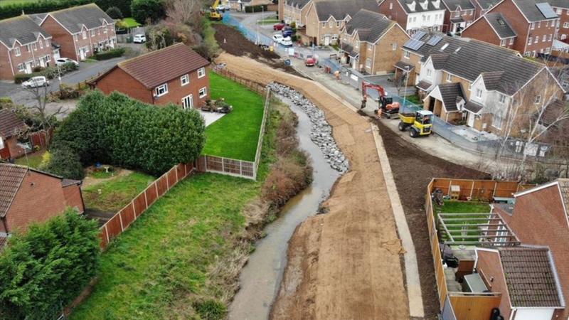 Restoration works of flood embankment completed in Gloucester - BBC News