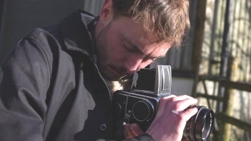 Bipolar artist's work on display in home town of Cardigan - BBC News