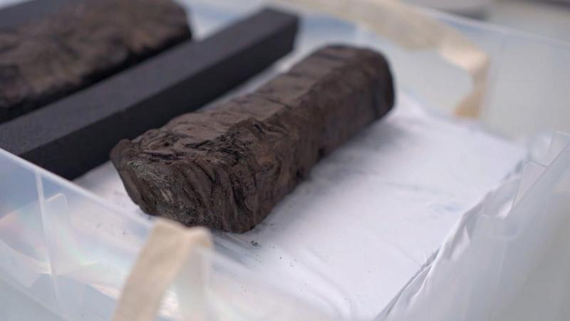First glimpse inside burnt scroll after 2,000 years - BBC News