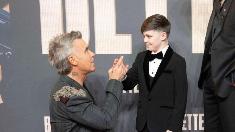 Robbie Williams explains why he's a monkey in his new movie - BBC News