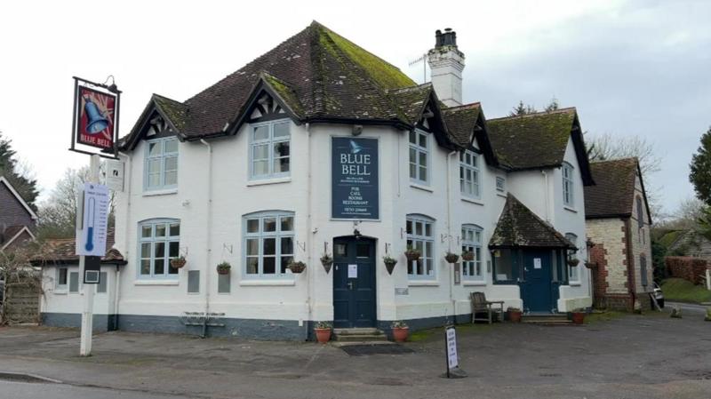 Farnham community pub saved from closure is 'thriving' - BBC News