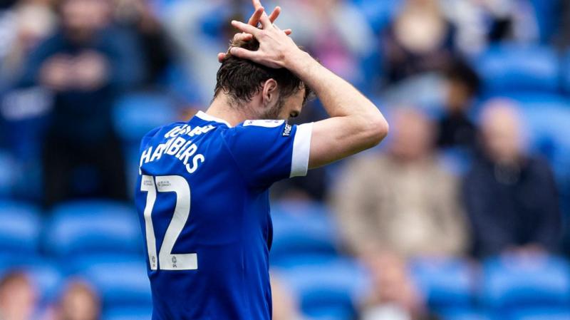 Wrexham AFC: Hollywood stars and fans celebrate historic promotion - BBC News