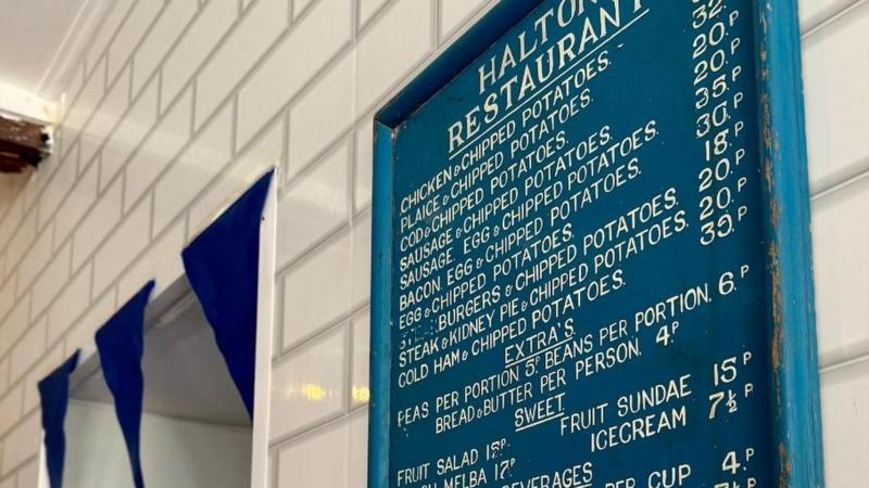 Fish and chips for 20p? The Powys chip shop menu frozen in time - BBC News