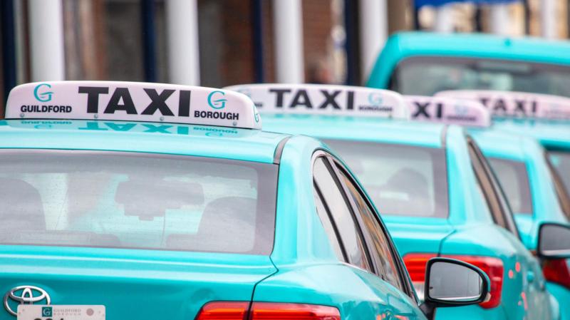 Use licensed taxis on New Year's Eve, Guildford council says - BBC News