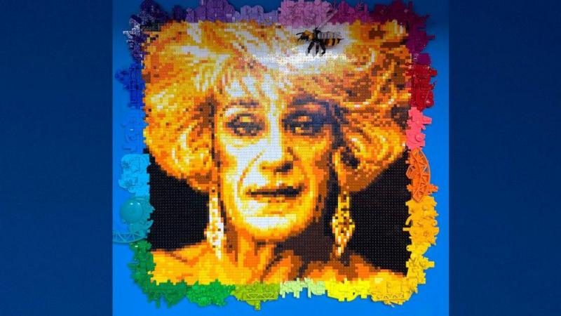 Pride: Manchester drag star dazzles in Lego mosaic - BBC News