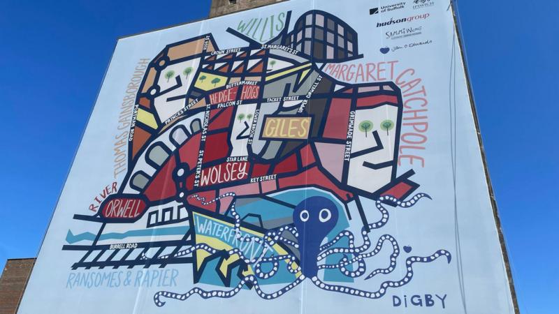 Ipswich waterfront new banner featuring octopus mascot unveiled - BBC News