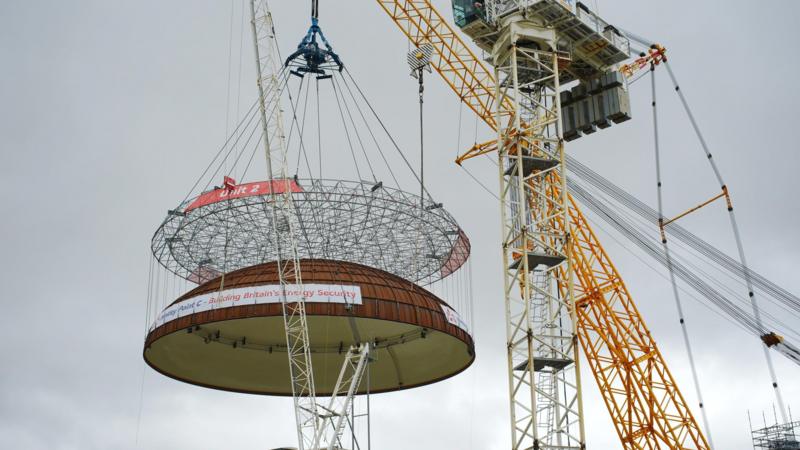 Huge dome lifted onto Hinkley Point C nuclear reactor - BBC News