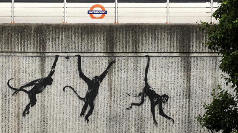 Banksy's final work in series appears on London Zoo gates - BBC News