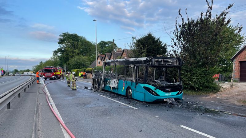 A52 bus fire: Drivers told to avoid main road due to blaze - BBC News