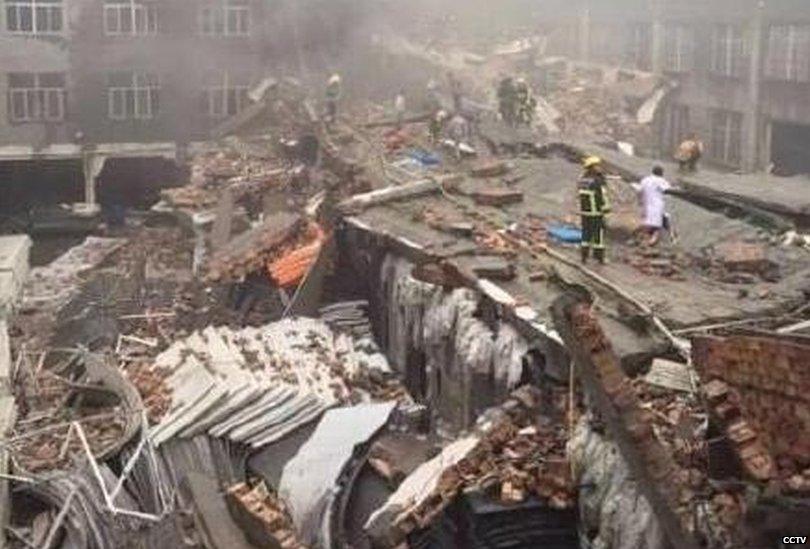 China factory collapse: Six dead and 49 rescued - BBC News