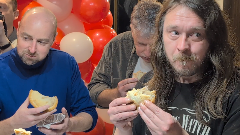 Wigan pie-eating champion polishes off pie in 64 seconds - BBC News