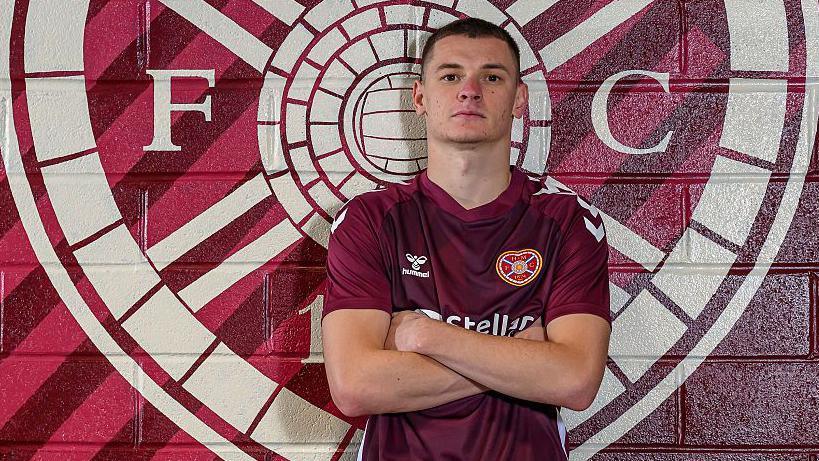 Chesnokov 'raring to get started' after completing Hearts move - BBC Sport