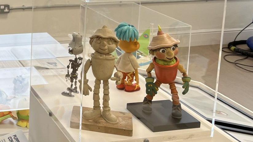 Popular cartoon props on permanent show after archive saved - BBC News