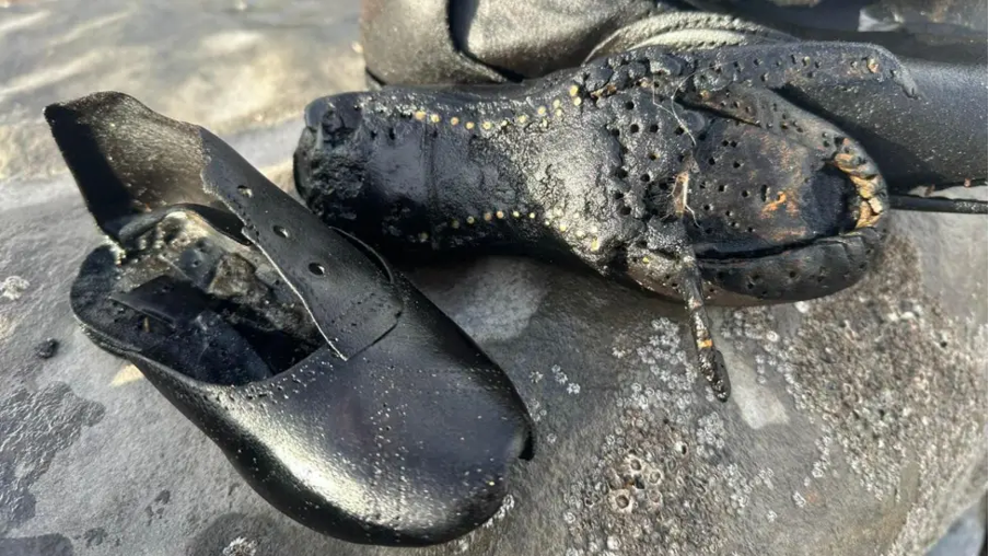 Hundreds of Victorian shoes wash up on Ogmore beach, Wales. - BBC Newsround