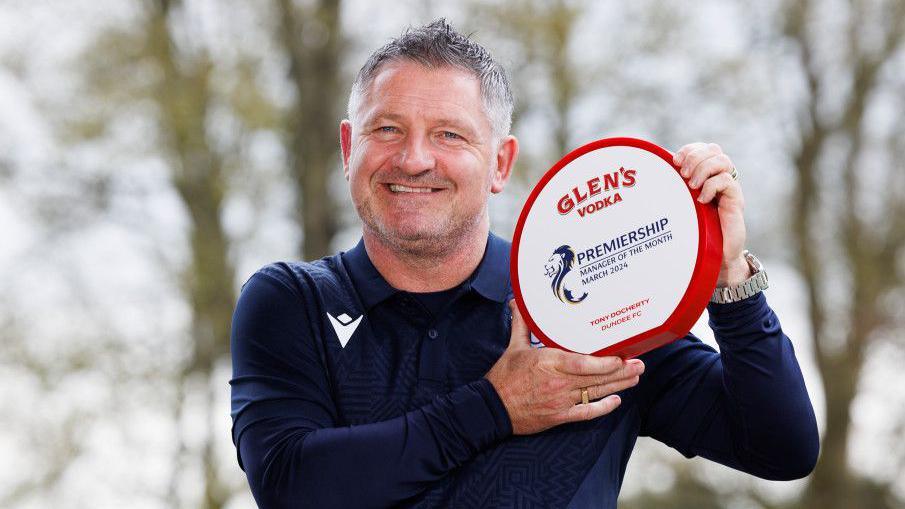 Docherty 'humbled' by manager of month award - BBC Sport