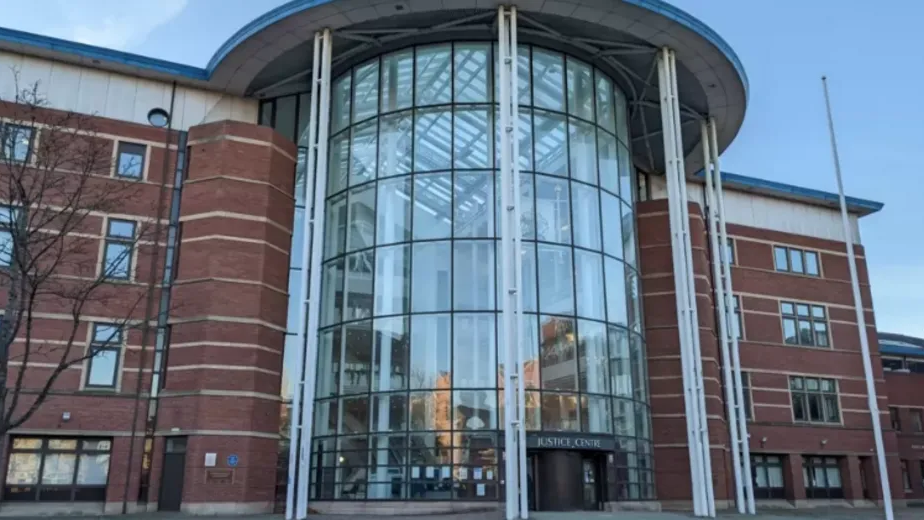 Woman charged after man stabbed in the back in Keyworth house - BBC News