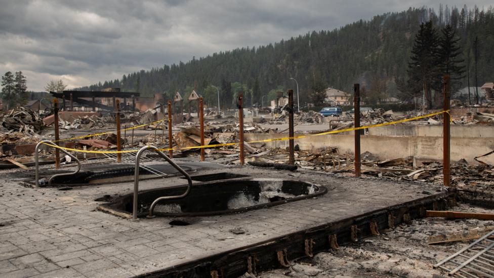 Jasper fire: Images show destruction from wildfire in Canada - BBC News
