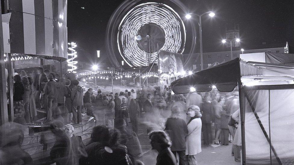 Historic annual mop fair returns to Cirencester market place - BBC News