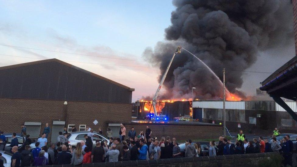 Leeds industrial unit hit by suspicious fire to be 'taken down' - BBC News