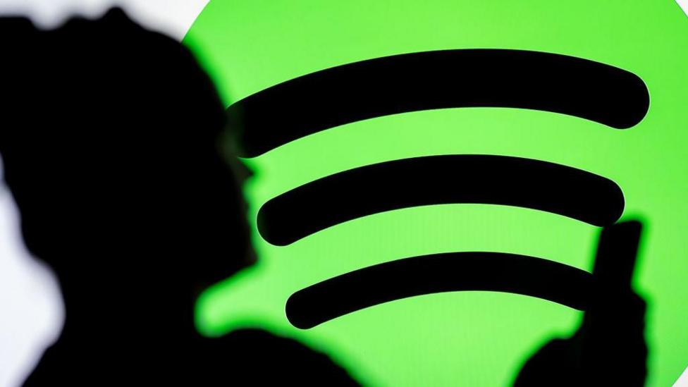 Spotify 'back and functioning normally' after global outage - BBC News